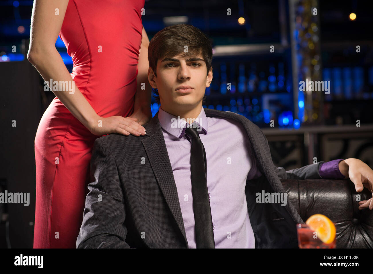 Portrait of a successful man in a nightclub Stock Photo - Alamy