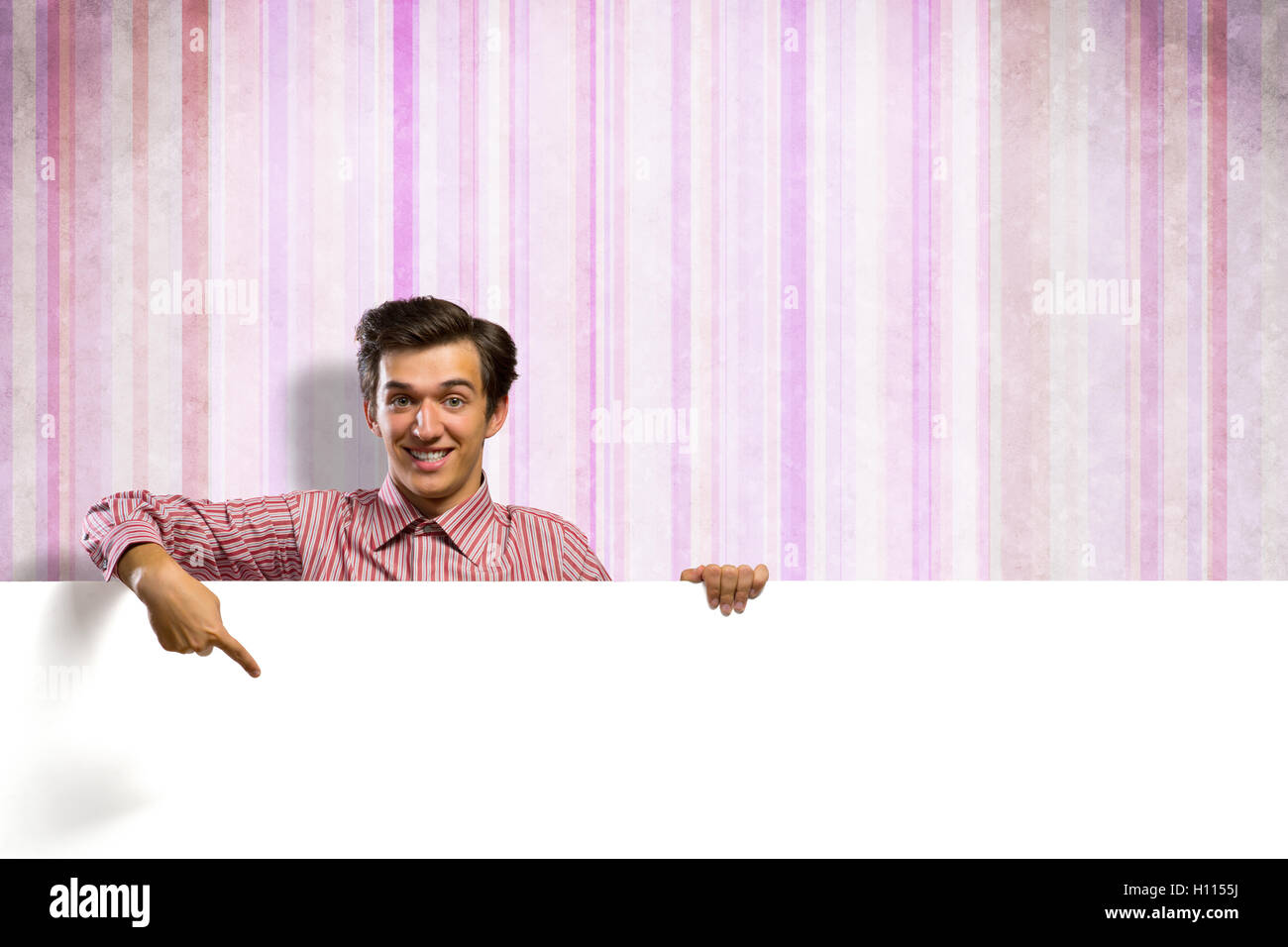 man holding a banner Stock Photo - Alamy