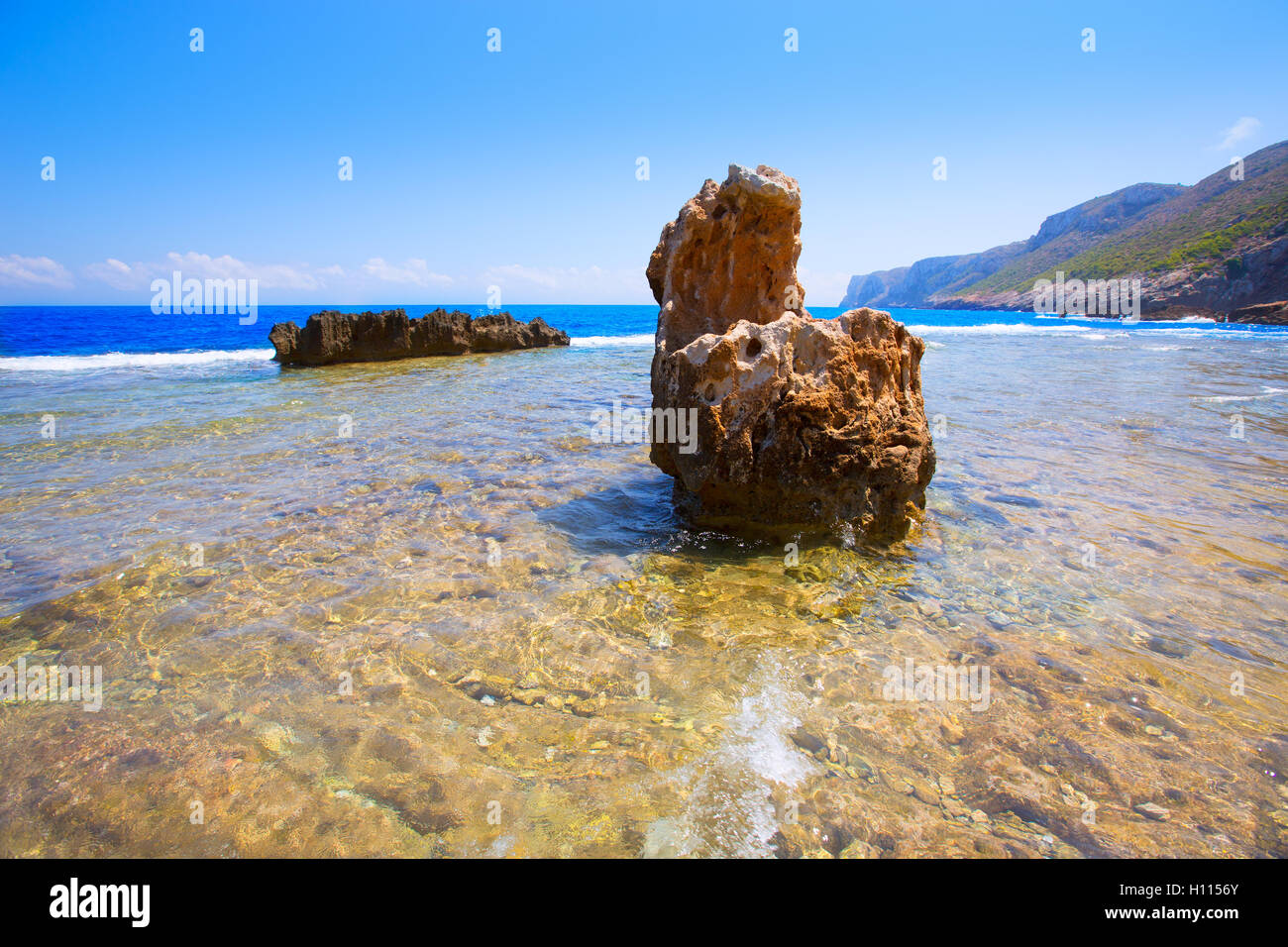 Denia Alicante Las rotas rocky beach in Spain Stock Photo - Alamy
