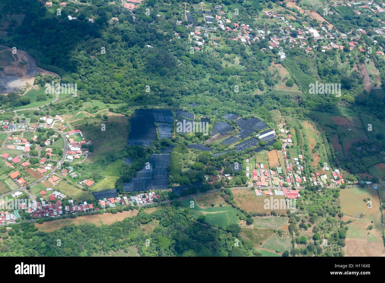 Alajuela, Costa Rica - May 24 : Aerial view of a small town in the ...
