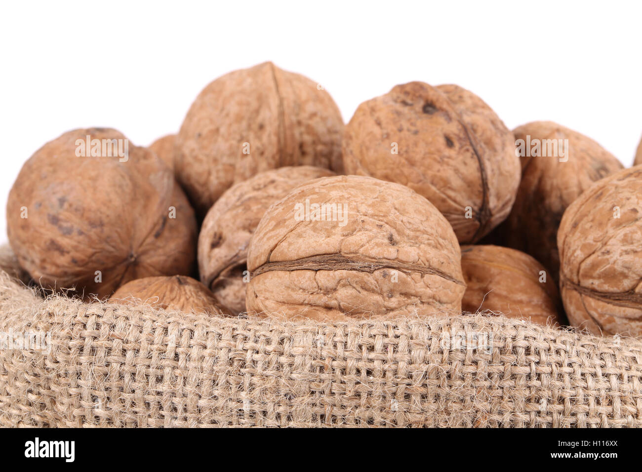 Sack full of walnuts. Close up Stock Photo - Alamy