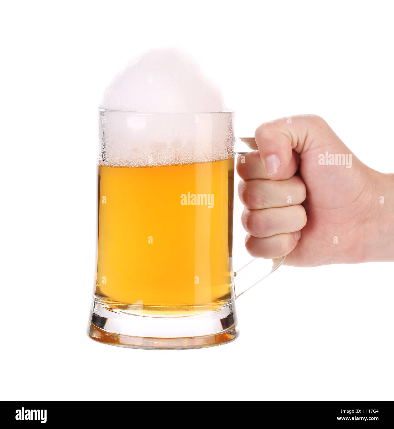 Man hand holds beer in mug Stock Photo - Alamy