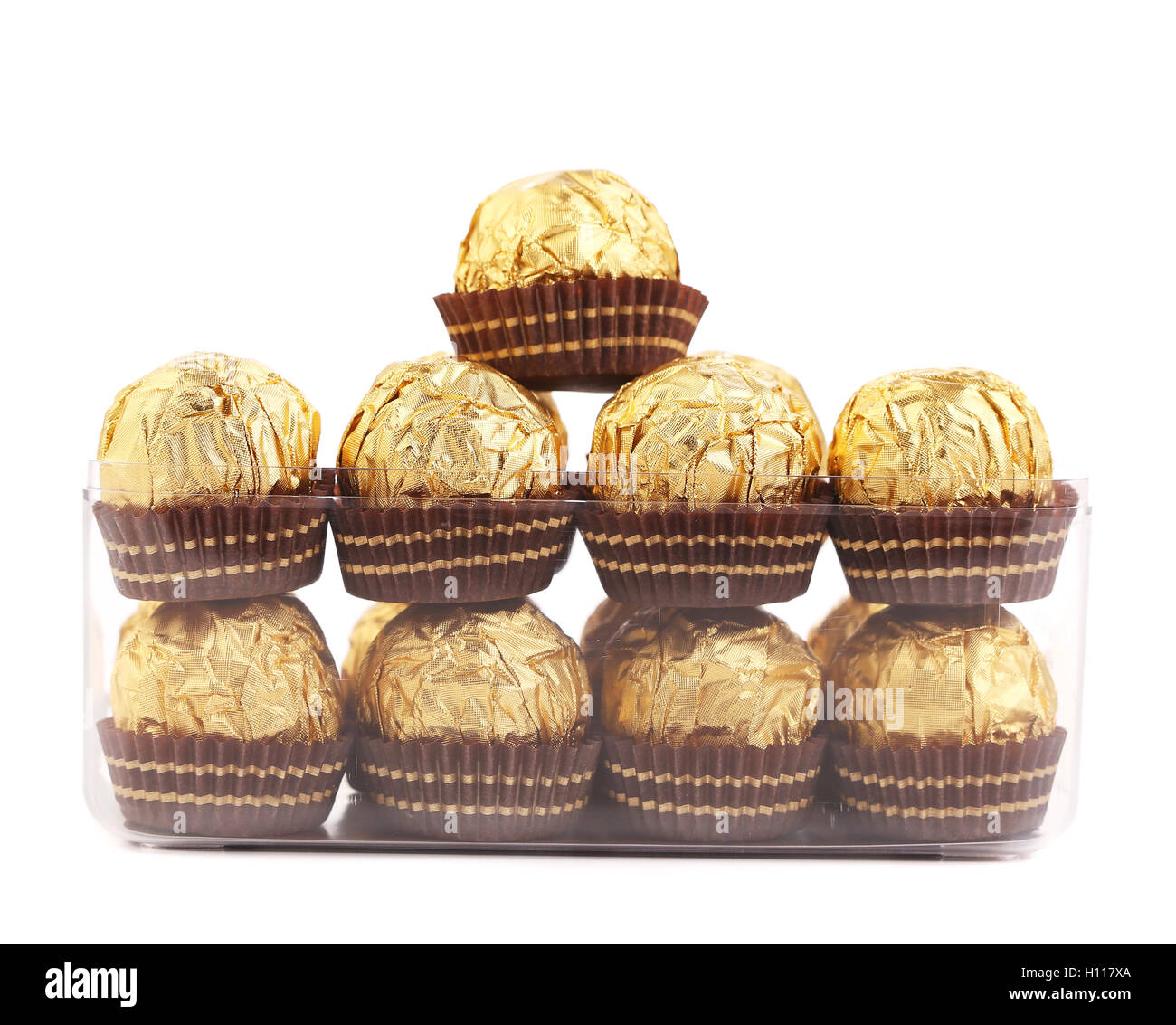 Two rows of chocolate bonbons in box Stock Photo - Alamy