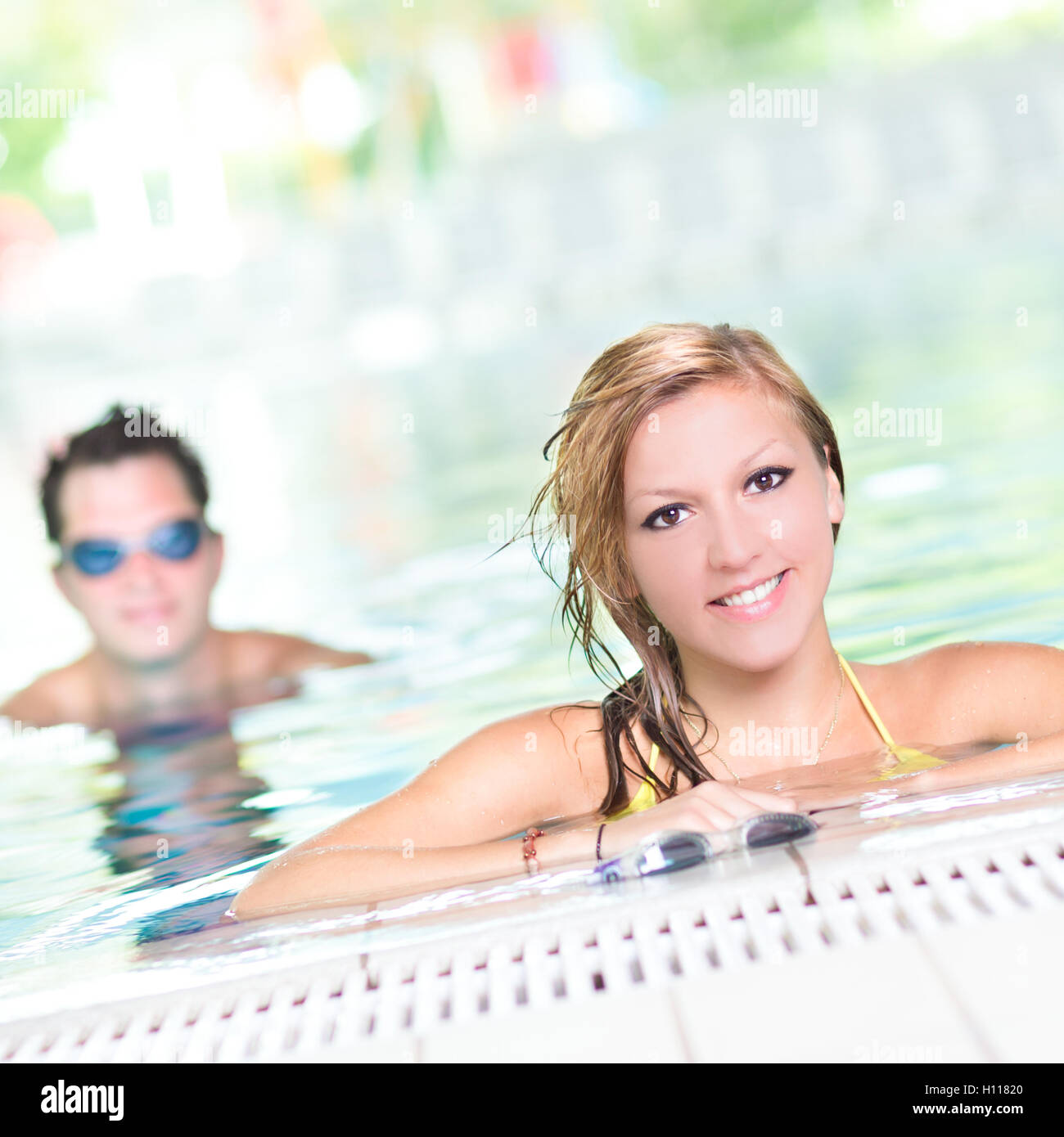 Cheerful cute couple in swimsuit hi-res stock photography and images ...