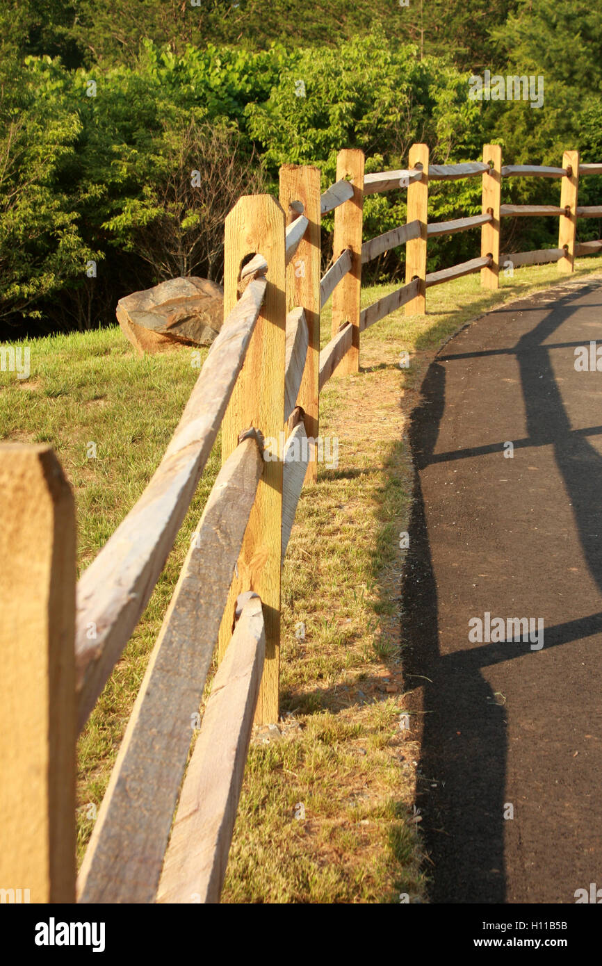 Wooden fence along park hi-res stock photography and images - Alamy