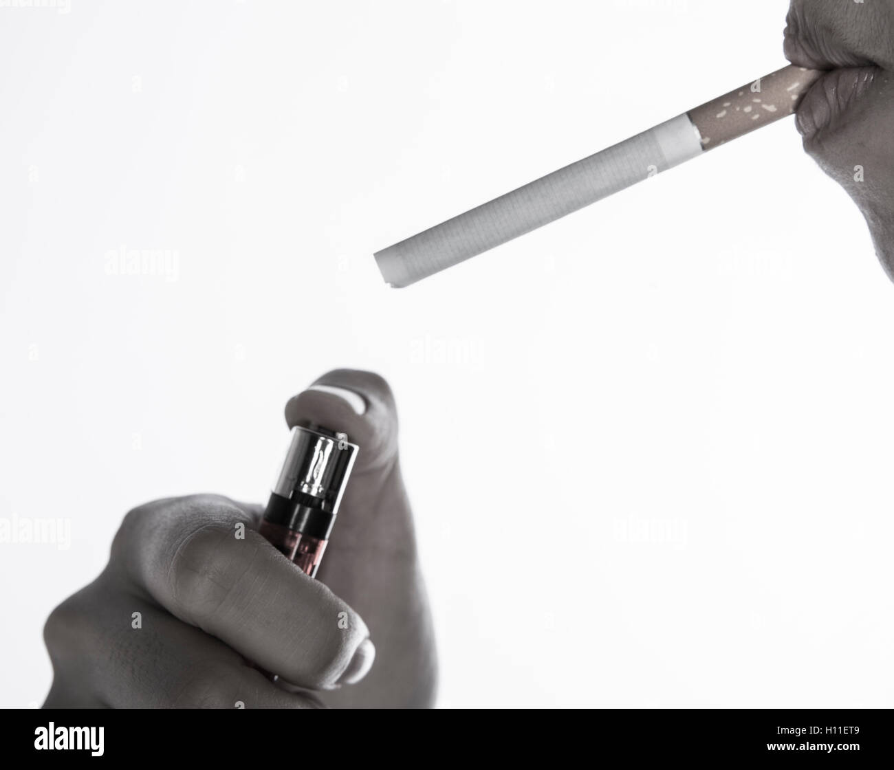 Closeup of woman smoking, hand with a lighter Stock Photo - Alamy