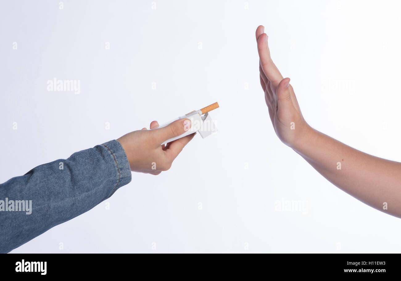 No smoking sign, a hand refusing cigarette offered by others for health ...