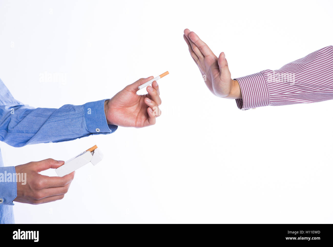 No smoking sign, a hand refusing cigarette offered by others for health ...
