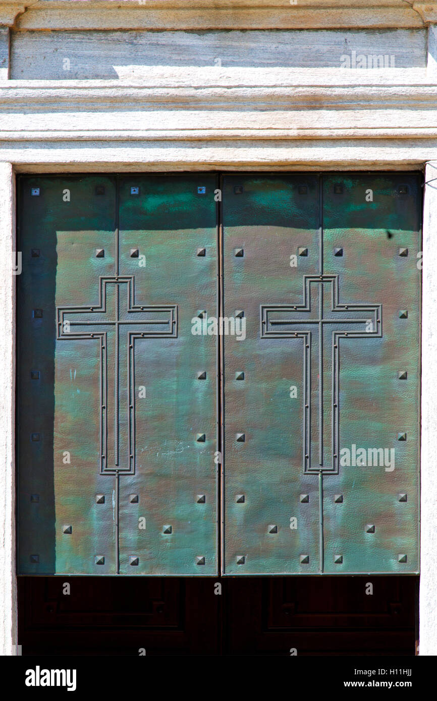 abstract church door in italy lombardy column the milano old closed ...