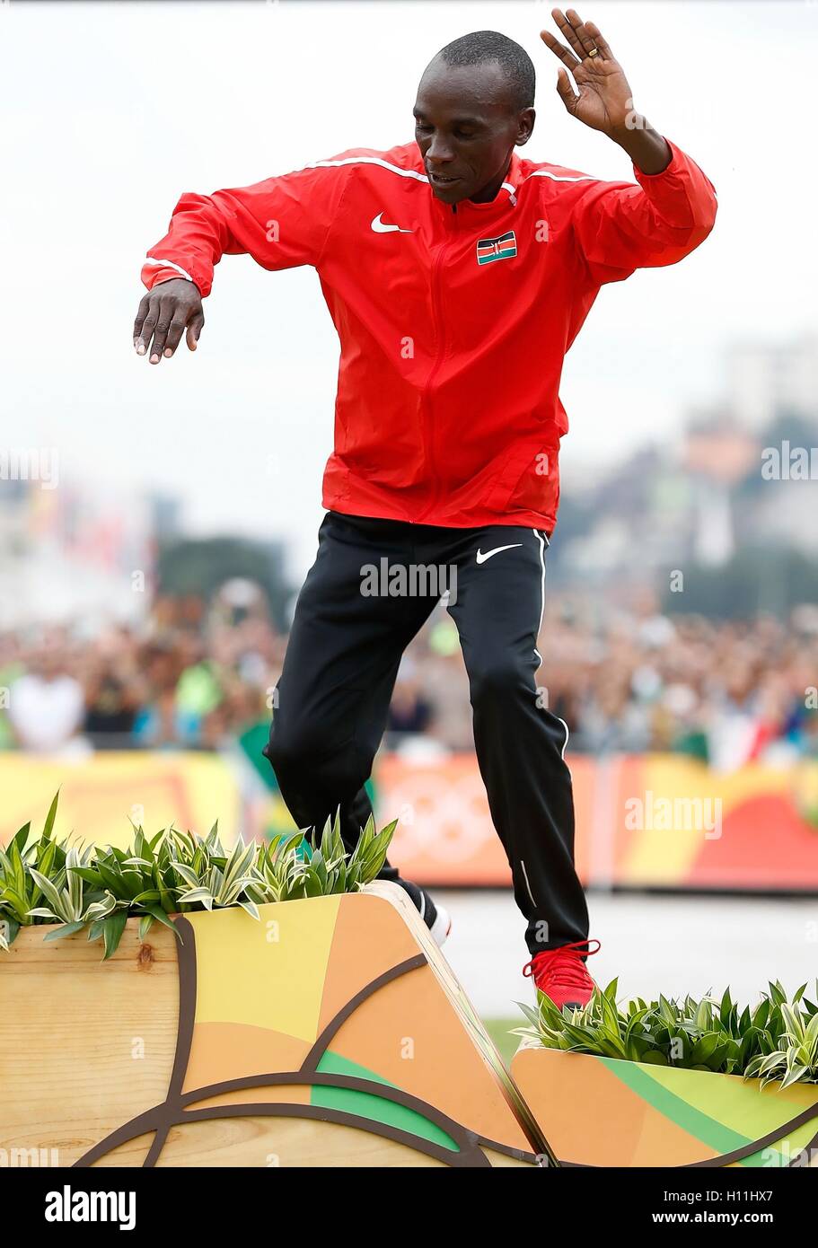 Eliud Kipchoge of Kenya celebrates after winning the men's marathon at ...
