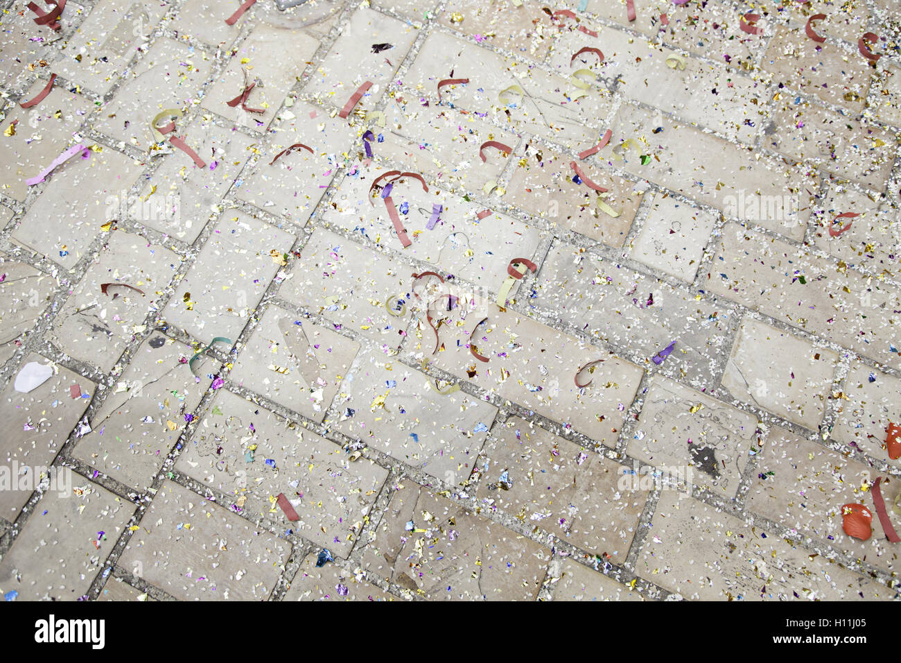 Floor confetti and rice in urban celebration, event Stock Photo - Alamy