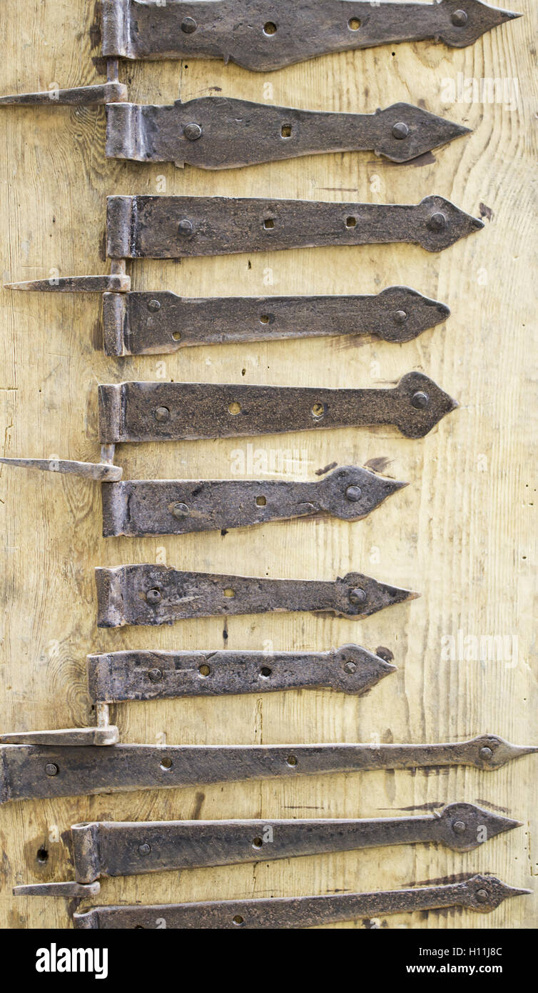 Rusty hinges and aged iron, security and decoration Stock Photo - Alamy