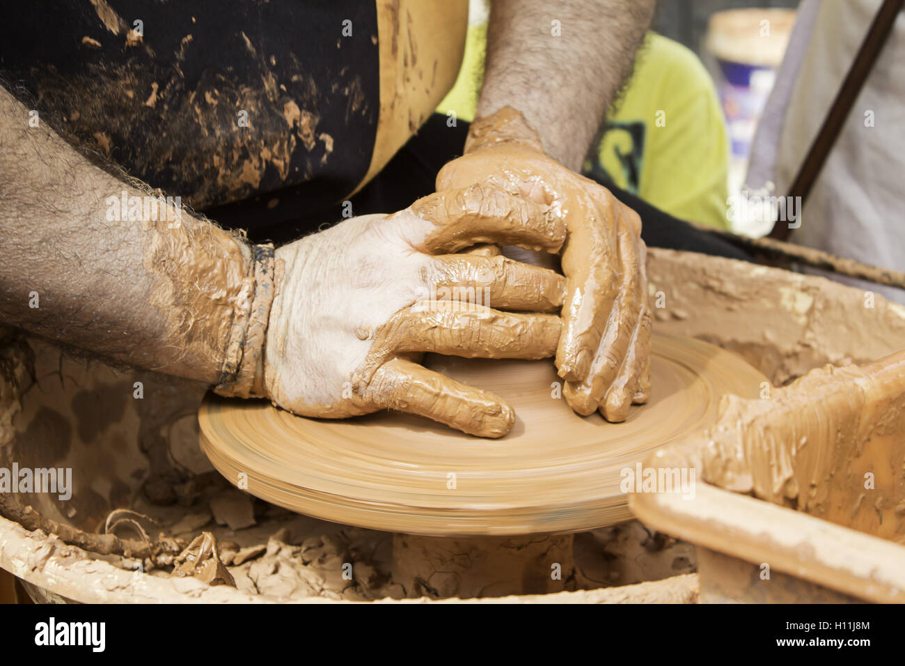Worker with shaping clay objects, profession and business Stock Photo ...
