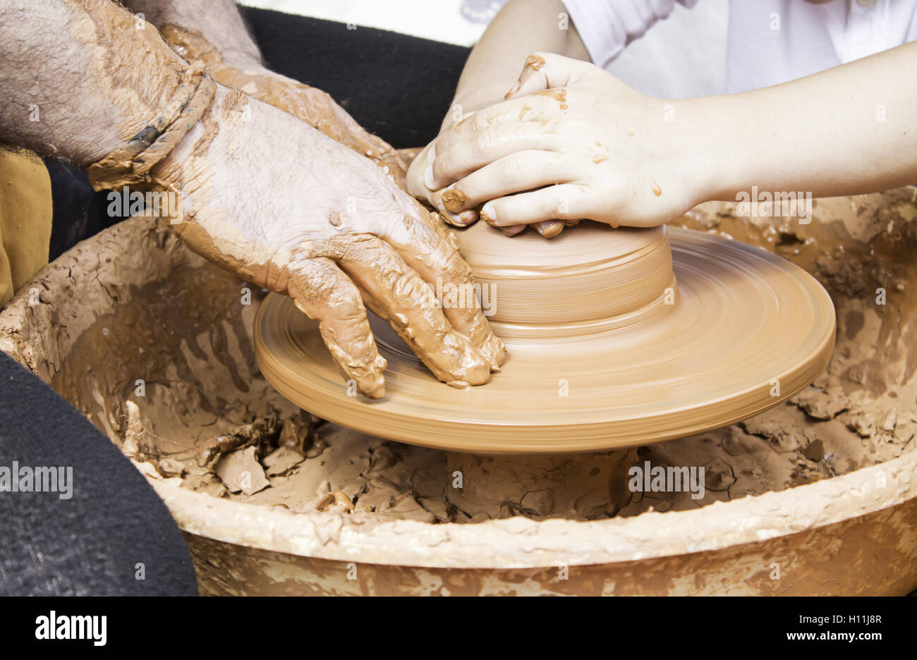 Worker with shaping clay objects, profession and business Stock Photo ...
