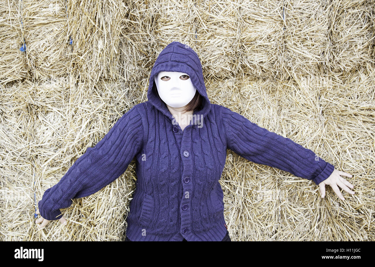 Masked woman in barn farm, halloween Stock Photo - Alamy