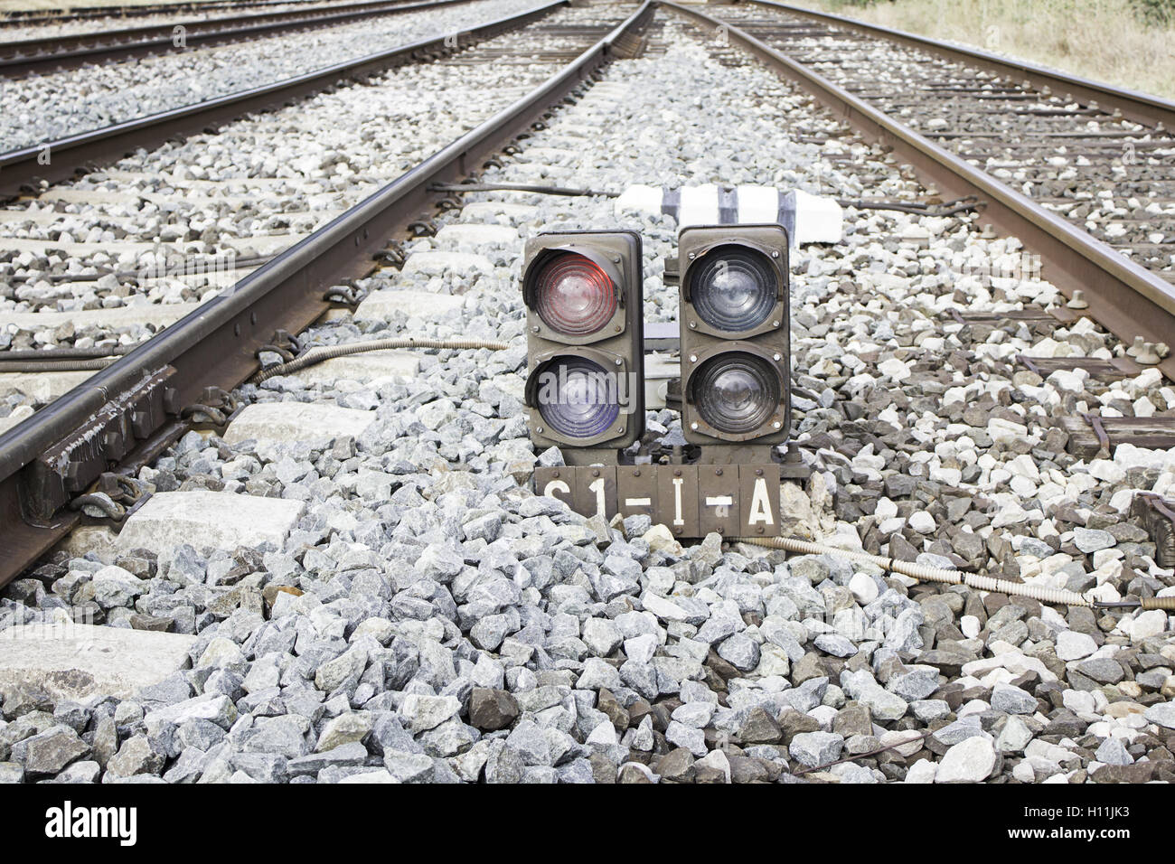 Railroad tracks with stones and rails, transport Stock Photo - Alamy