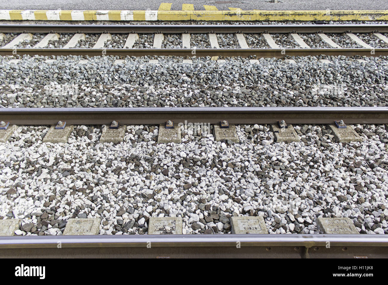 Railroad tracks with stones and rails, transport Stock Photo - Alamy