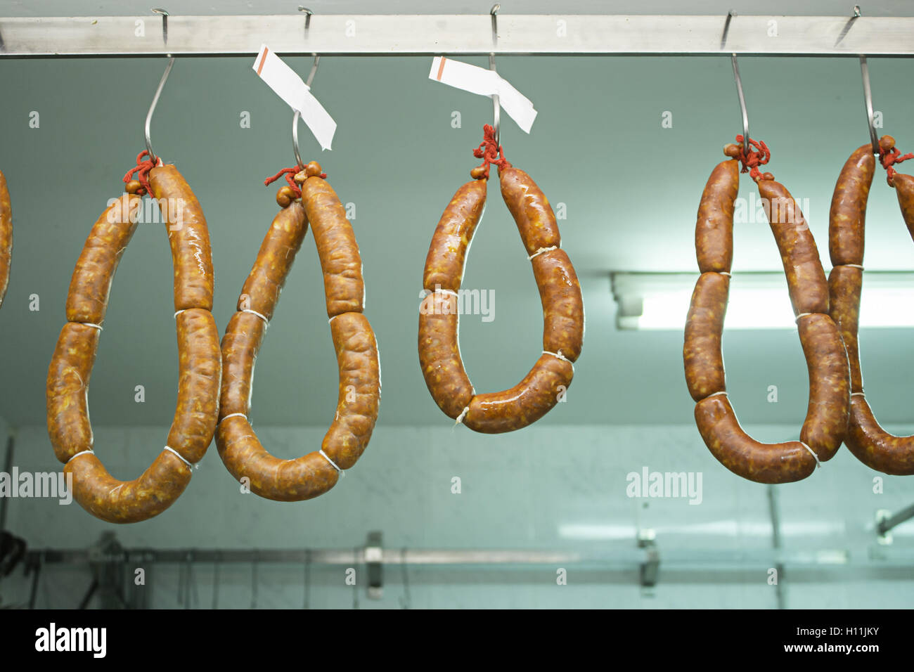 Sausage in and cured Charcuterie hanging, food Stock Photo - Alamy