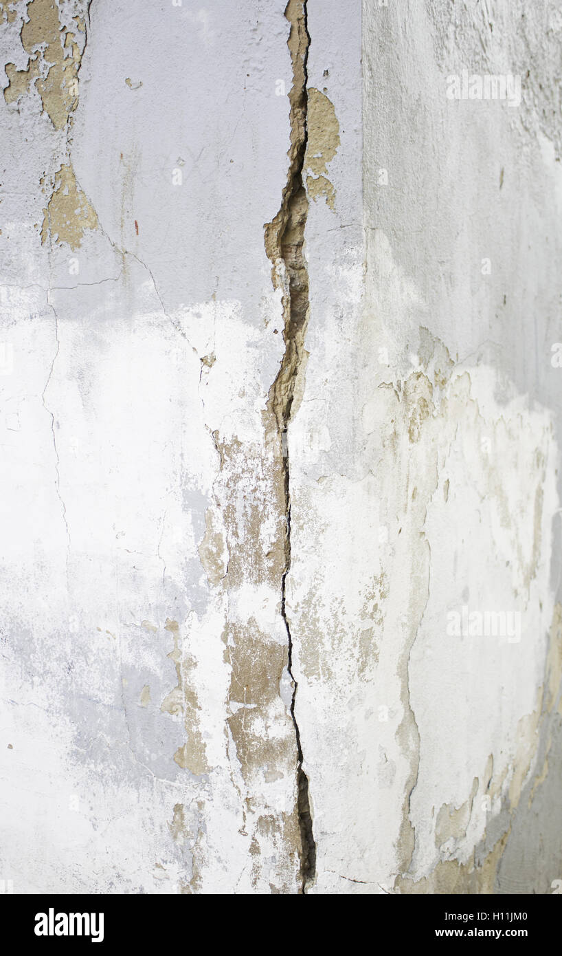 Broken open and urban building wall construction Stock Photo - Alamy