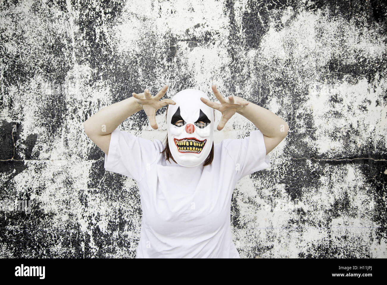 Clown mask criminal hi-res stock photography and images - Alamy