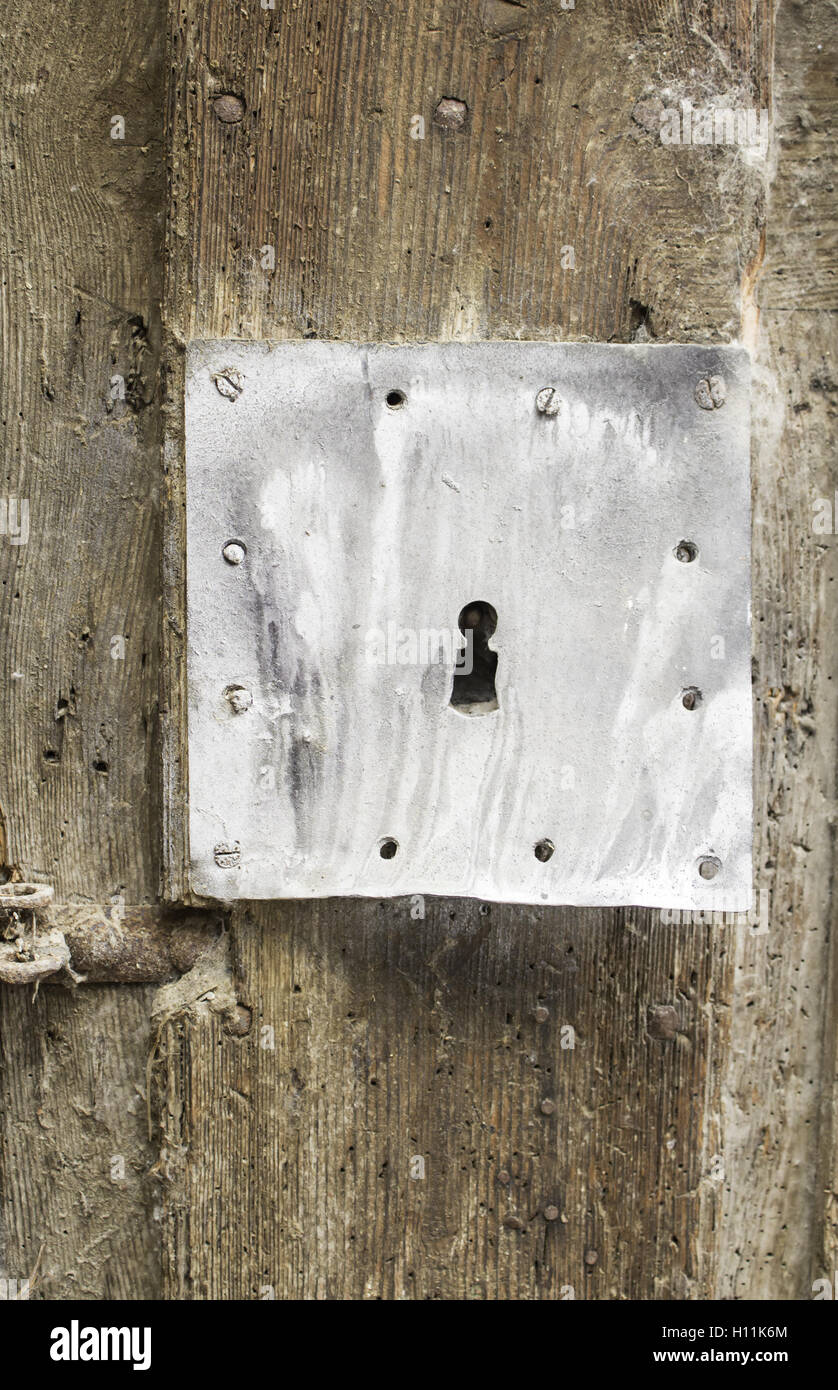 Aged wooden door lock, construction Stock Photo - Alamy