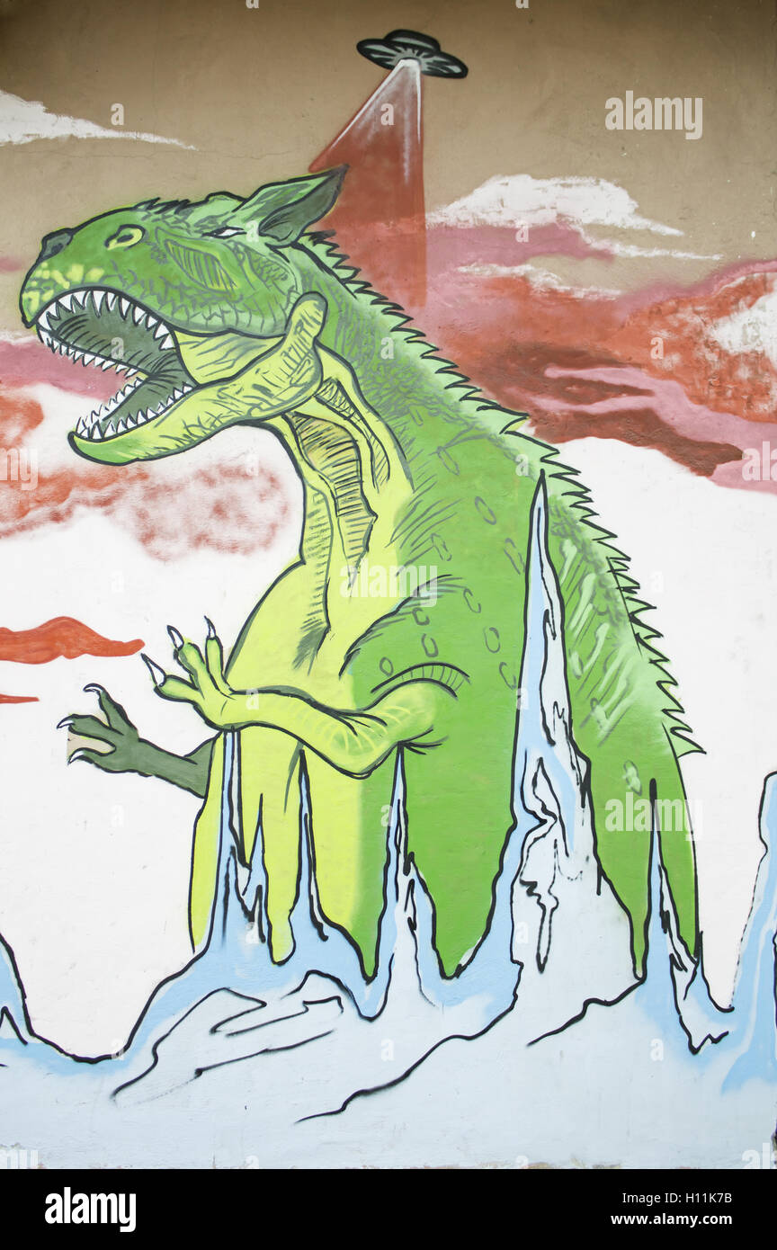 Graffiti godzilla attacked by spacecraft, drawing Stock Photo - Alamy