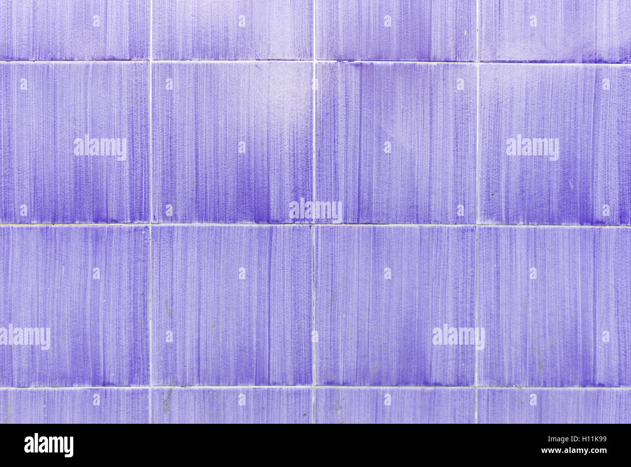 Wall tile purple in urban building, construction Stock Photo - Alamy