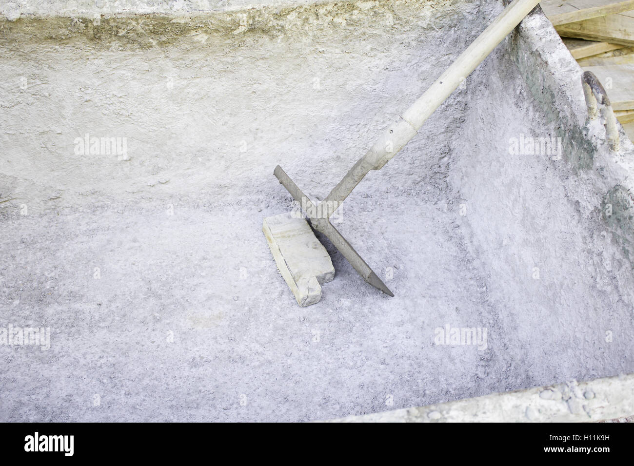 Cement and shovel work of construction material Stock Photo - Alamy