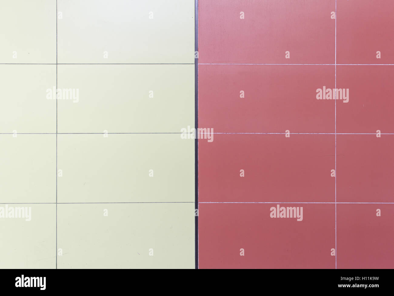 Red and yellow wall new tile, construction Stock Photo - Alamy