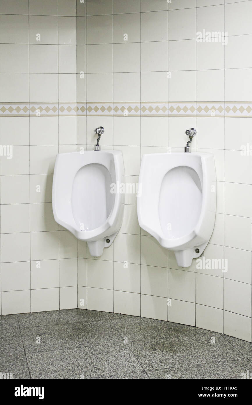Urinals for men hi-res stock photography and images - Alamy