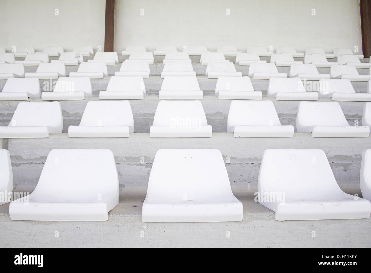 White seats tier in football, entertainment Stock Photo - Alamy