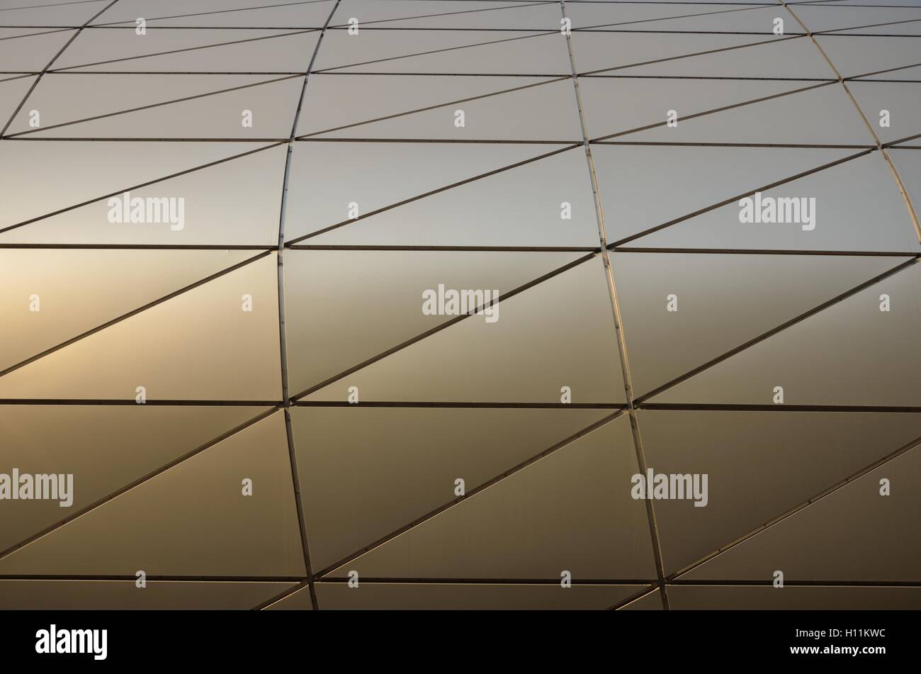 Gray triangles on a curved metal surface Stock Photo - Alamy