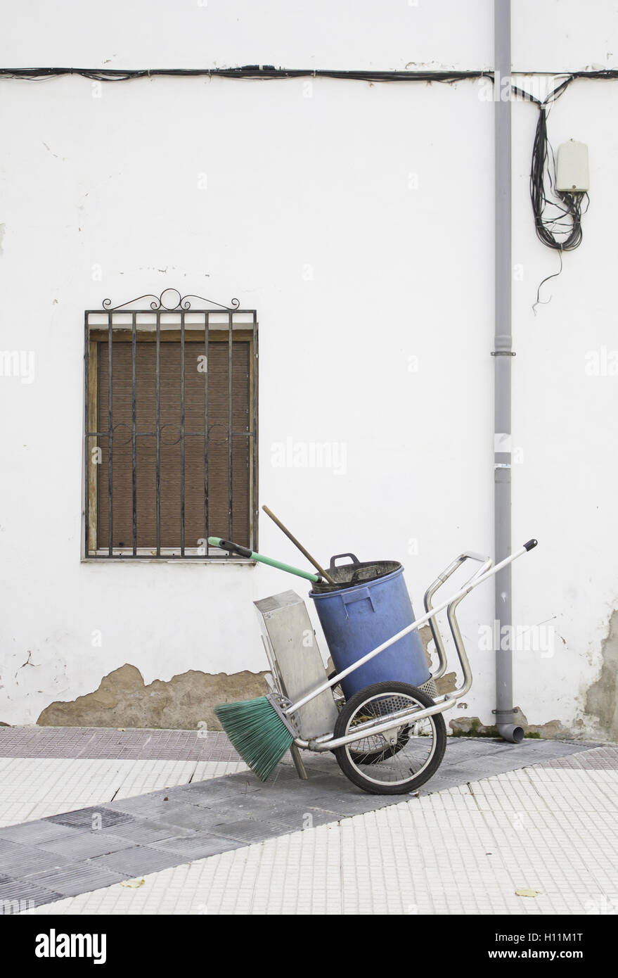 Trolley urban street sweepers, and cleaning work Stock Photo - Alamy