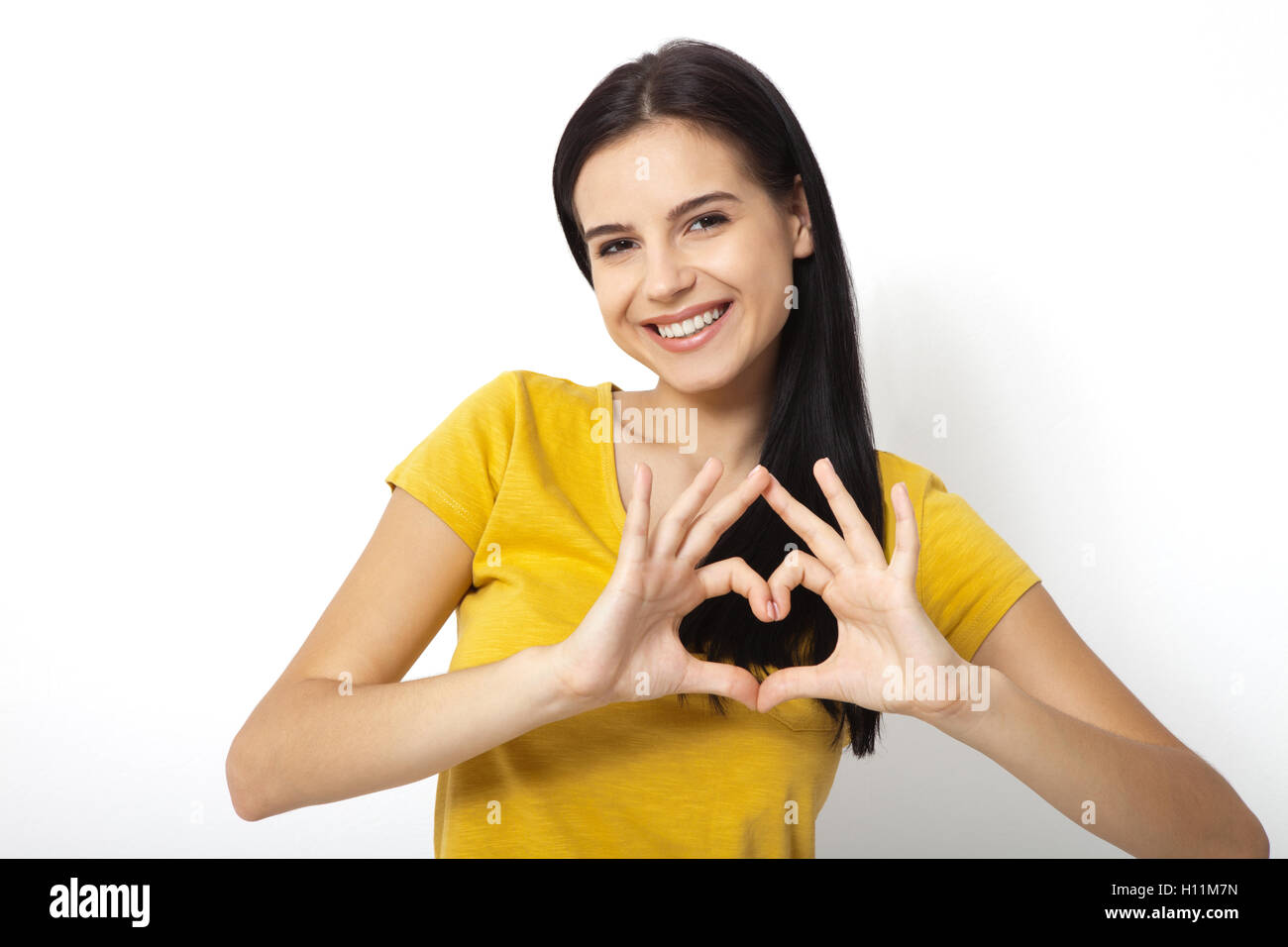 Girl doing hands heart hi-res stock photography and images - Alamy
