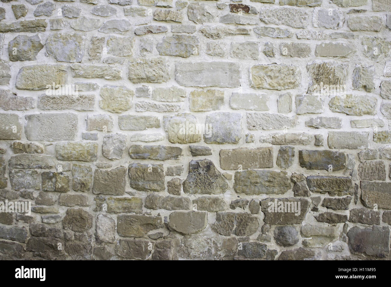 Dark Stone Wall in urban street construction Stock Photo - Alamy