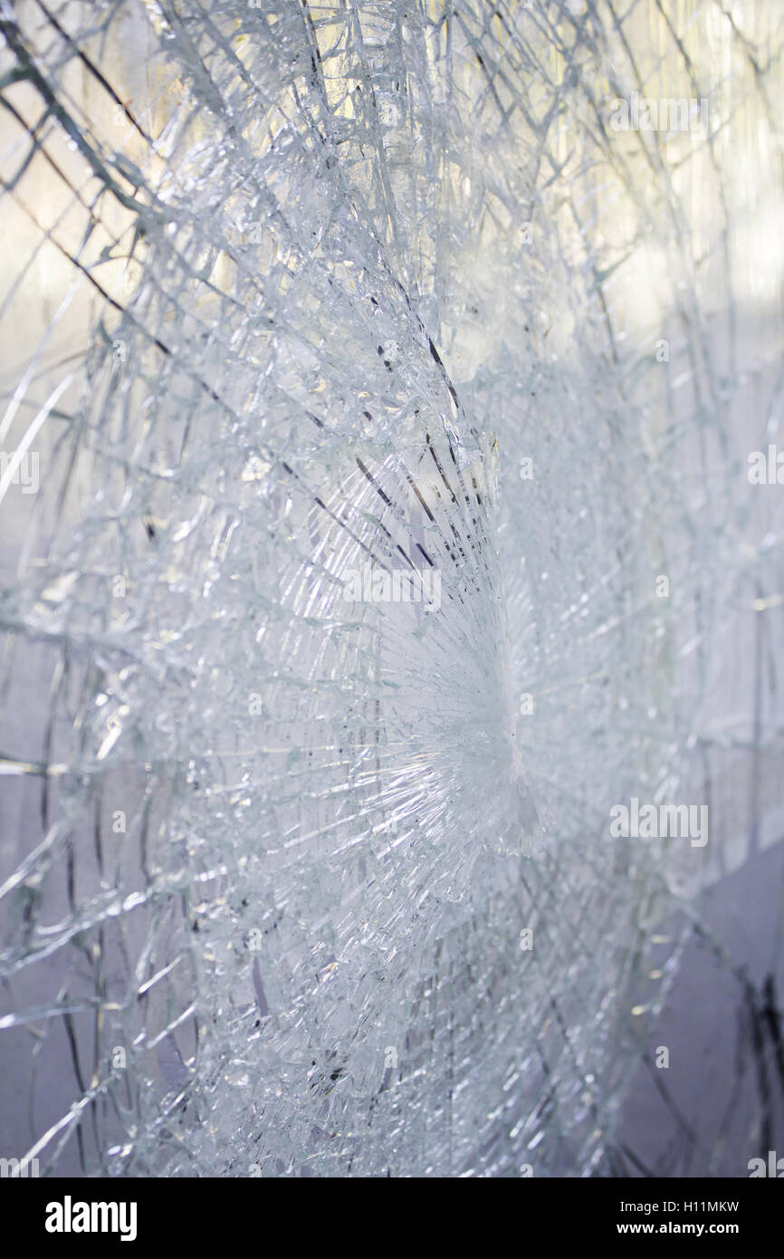 Window glass broken into urban building, smashing Stock Photo - Alamy