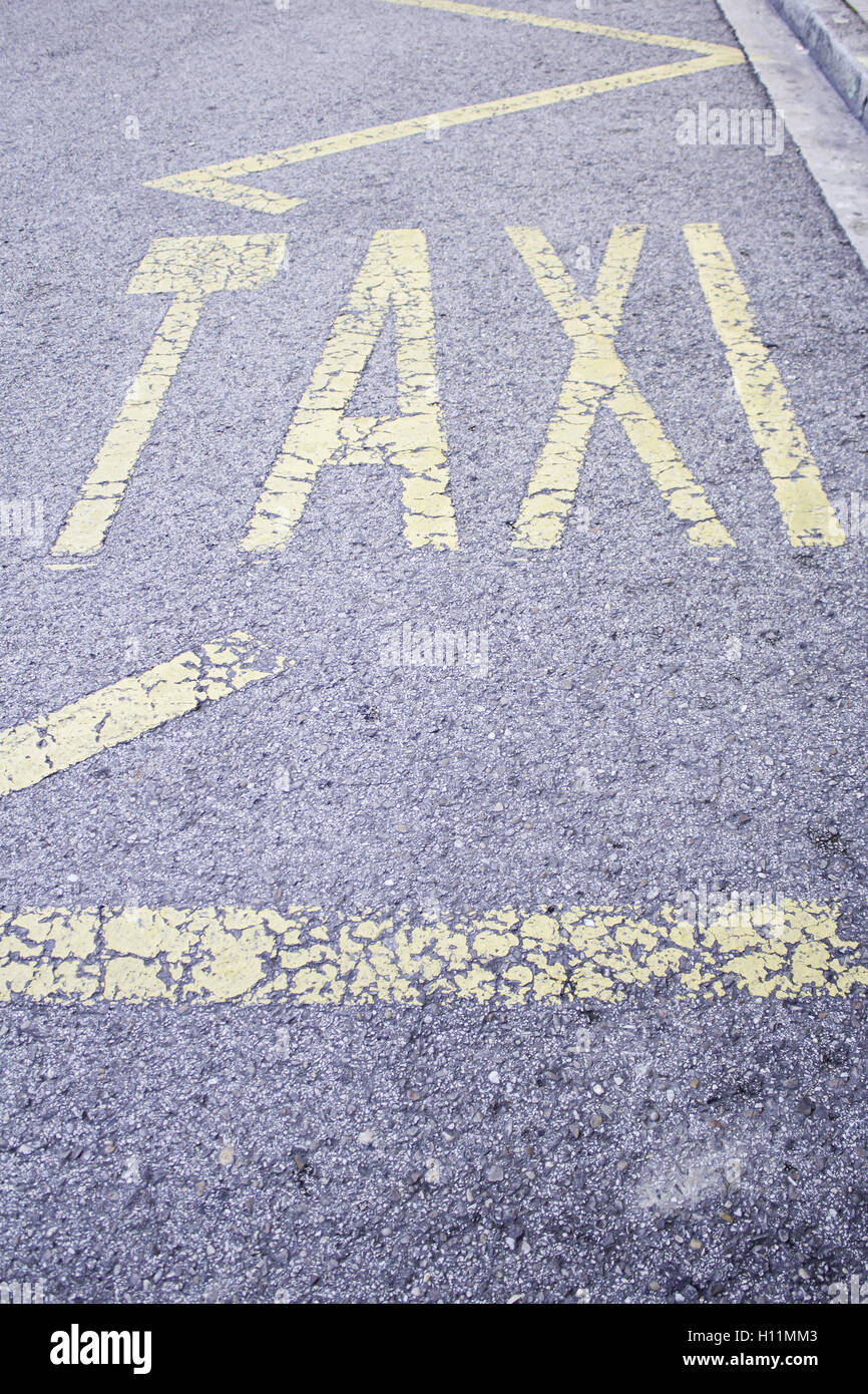 Taxi sign on urban road, vehicle and transportation Stock Photo - Alamy