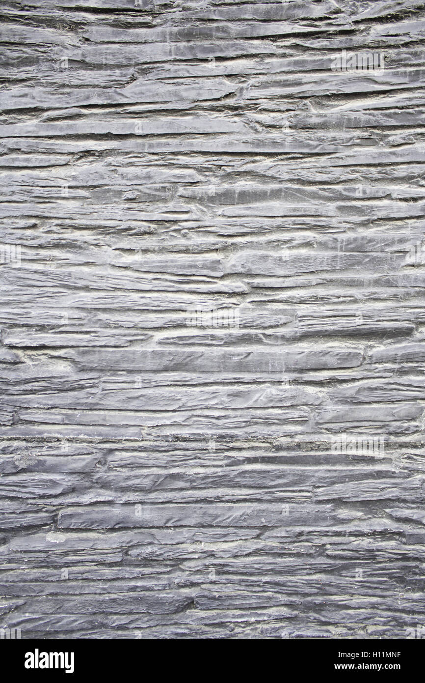 Gray stone wall in urban wall construction Stock Photo - Alamy