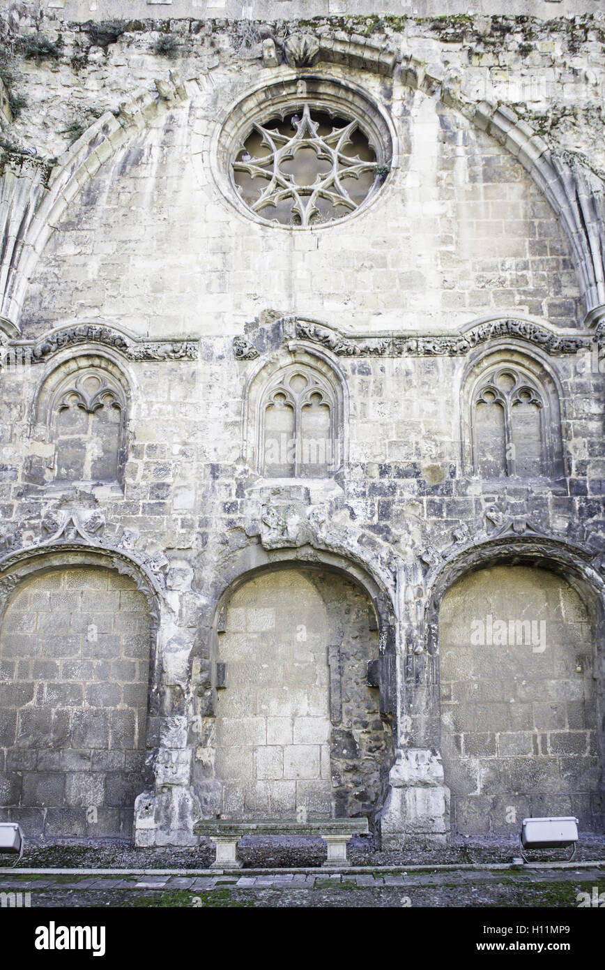 Gothic stone tower with a religious symbol Stock Photo - Alamy