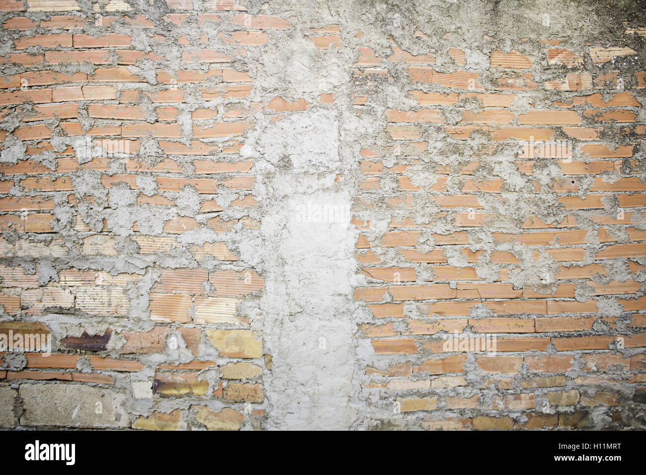 Wall bricks cemented in urban building Stock Photo - Alamy