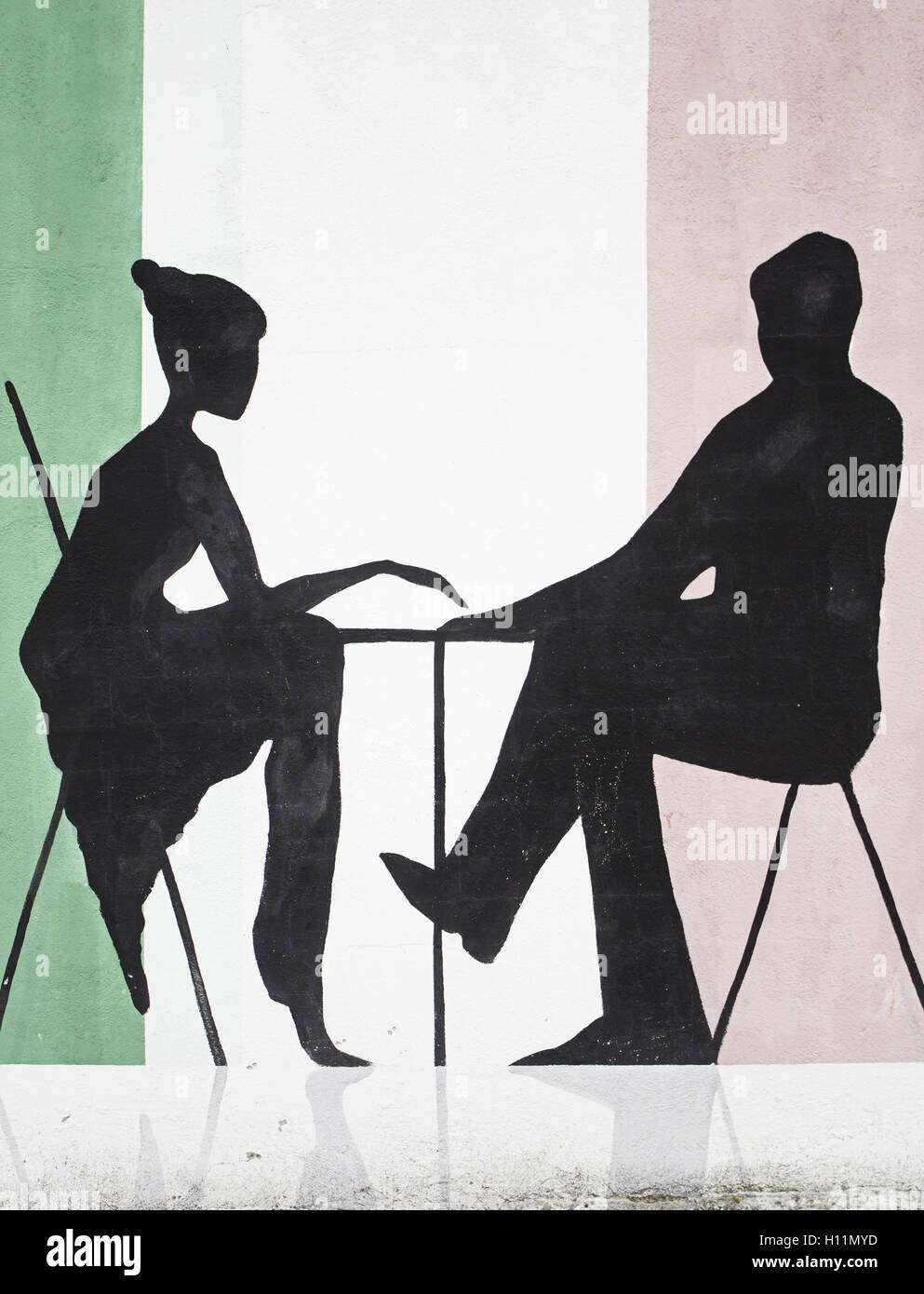 Couple at bar chatting, fun and entertainment Stock Photo - Alamy