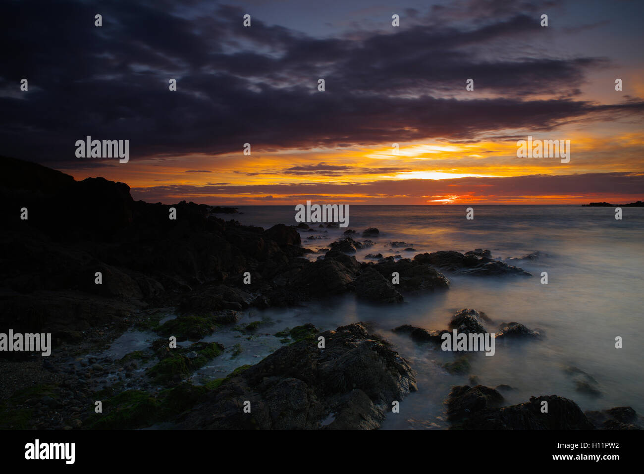 Sunset Porth Nobla Anglesey Stock Photo - Alamy