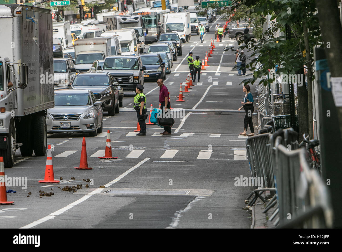 One lane of the 2nd Avenue is completely guarded off by the police ...