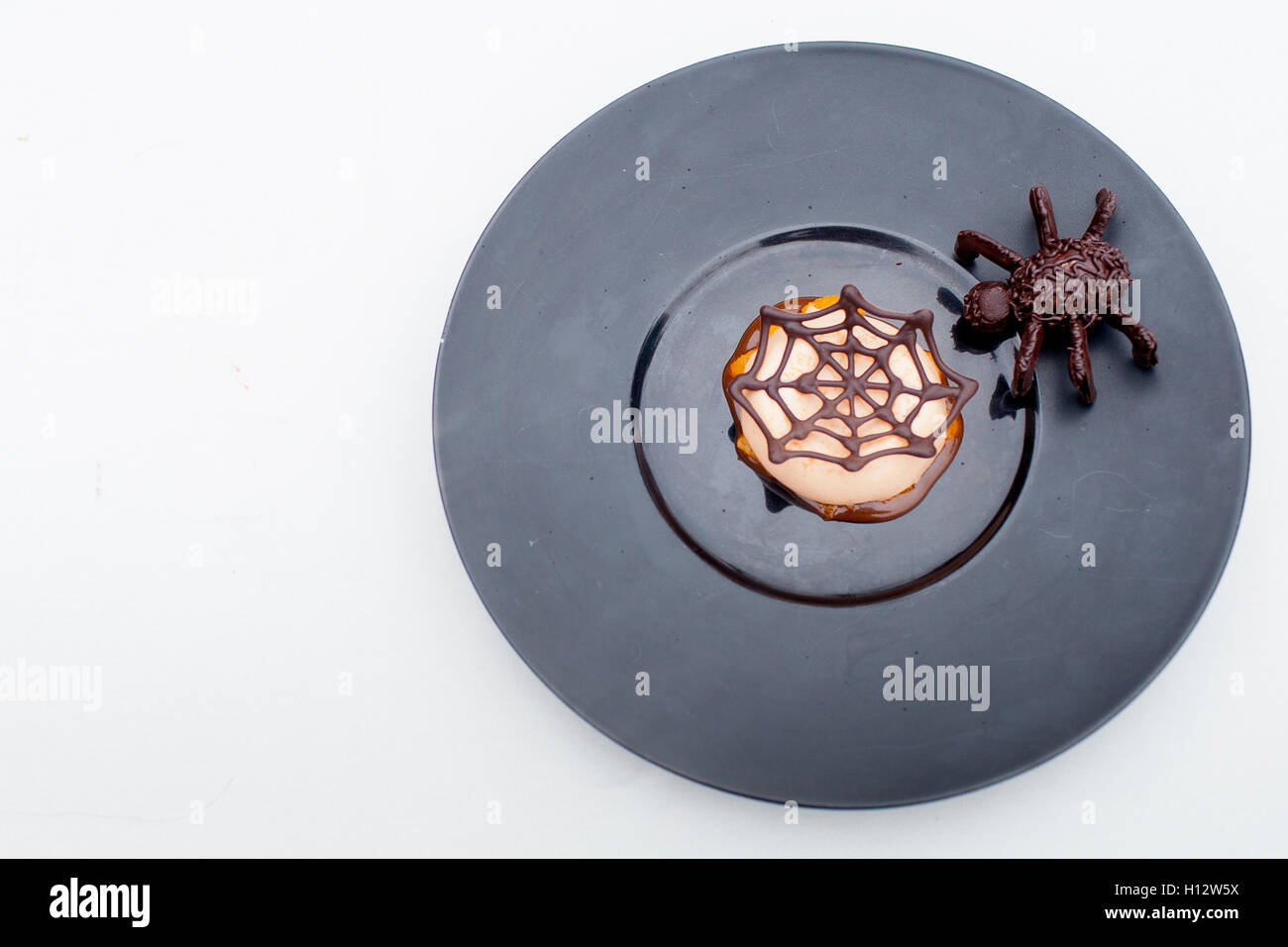 waffle with chocolate spider web Stock Photo - Alamy