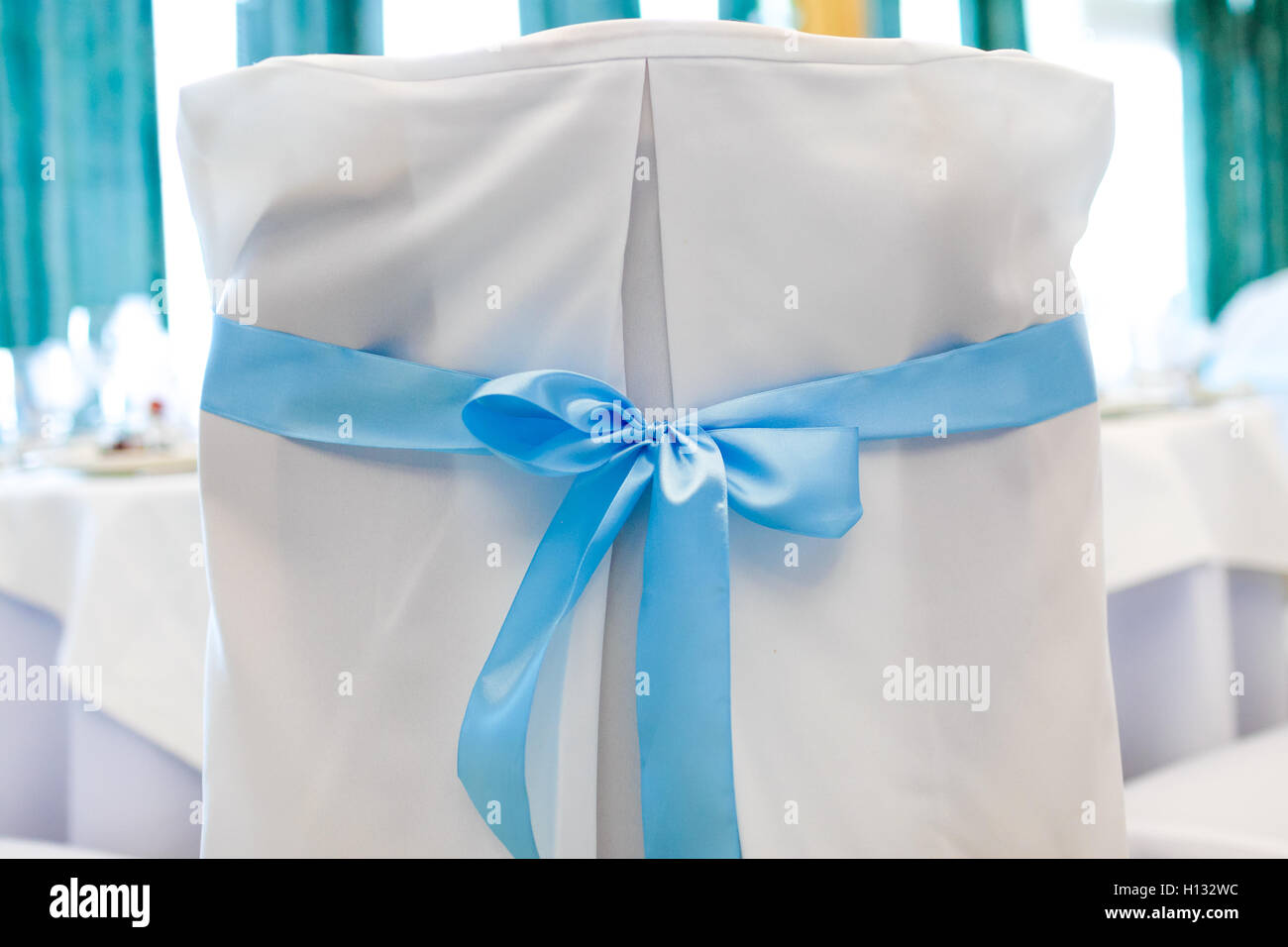 Chair, beautifully decorated with ribbon Stock Photo - Alamy