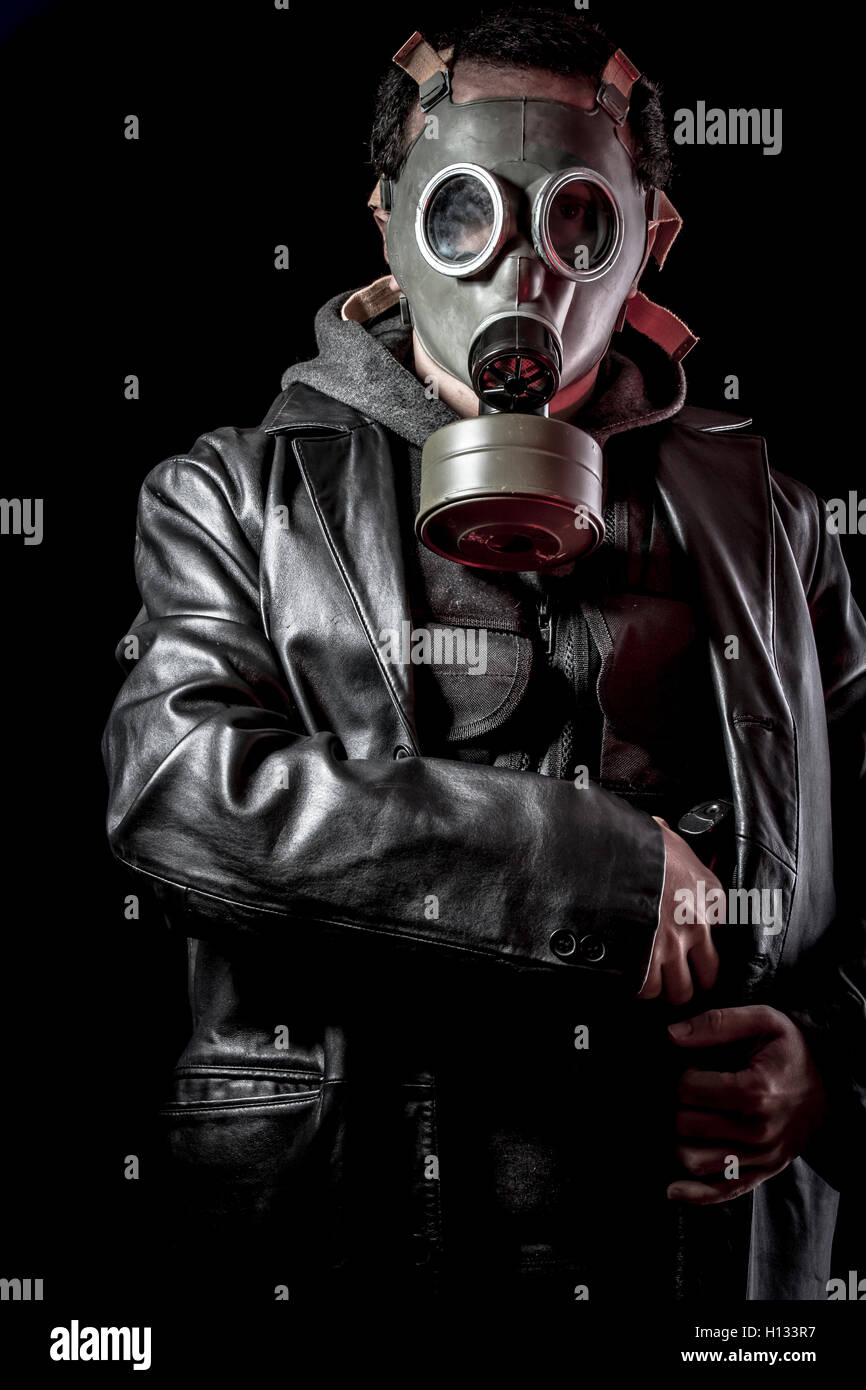 Terrorist, thief, armed man with black leather jacket, dangerous Stock ...