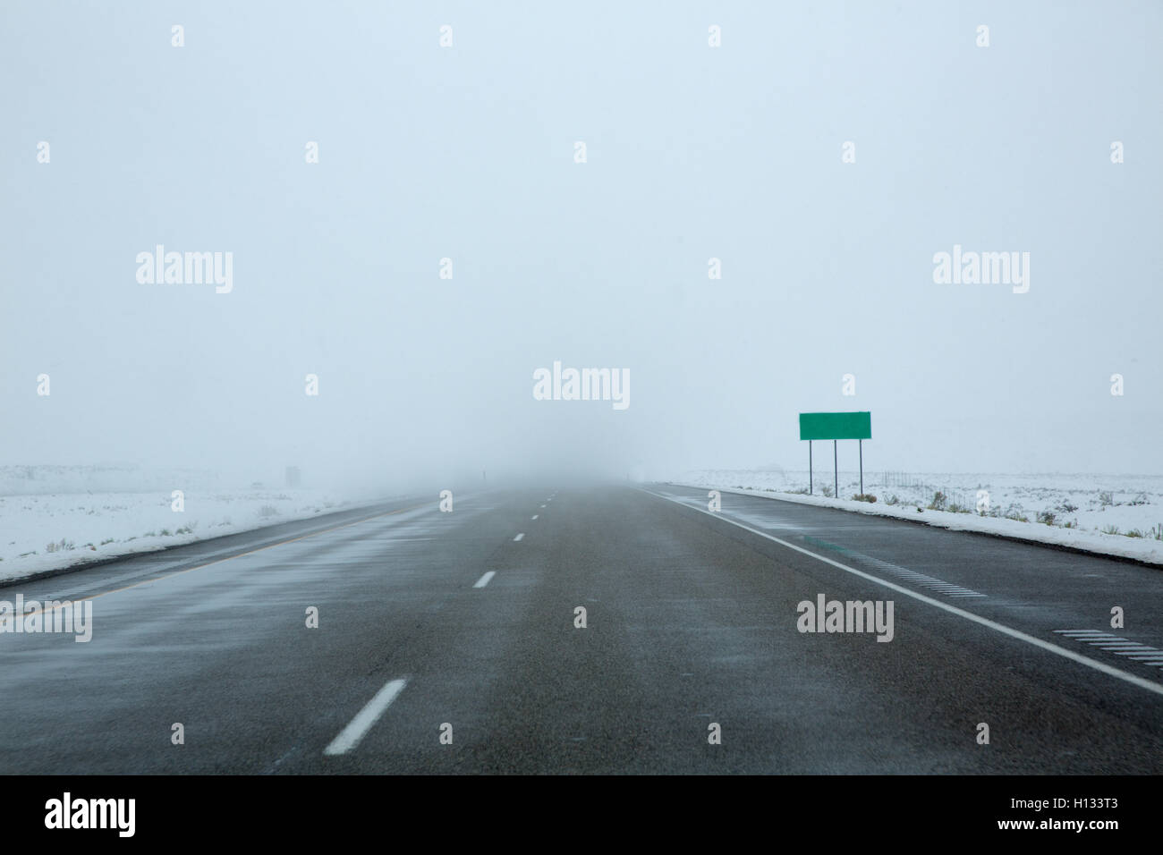 US snowing I 15 interstate snowed road in Nevada Stock Photo - Alamy