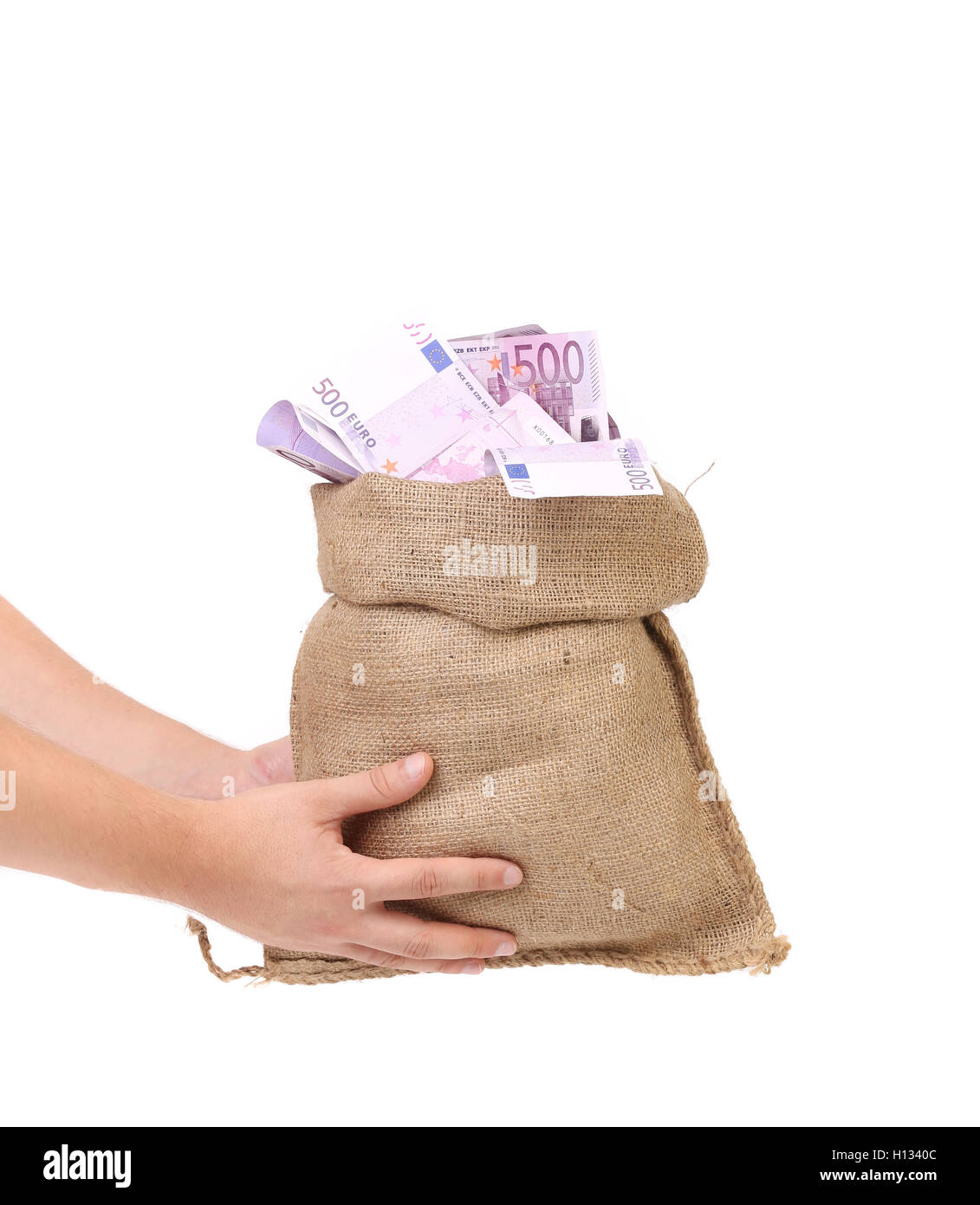 Hands holding bag full with euro bills Stock Photo - Alamy