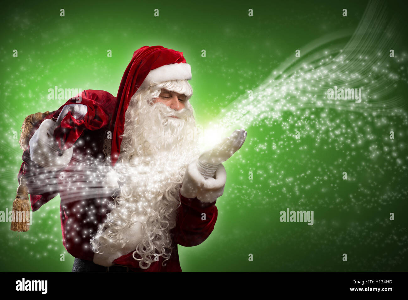 Santa Claus and the magic Stock Photo - Alamy