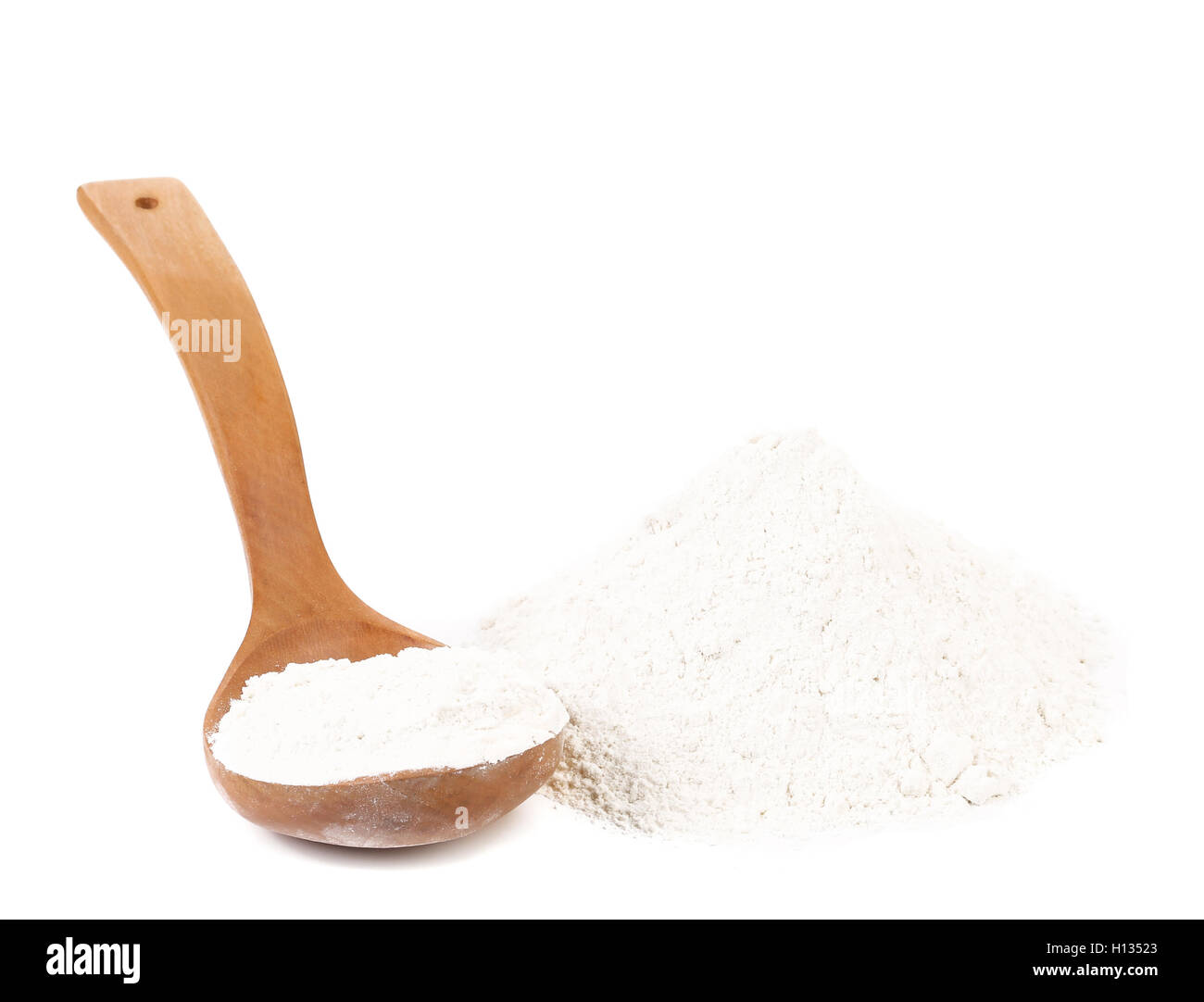 Whole flour in spoon and bunch Stock Photo - Alamy